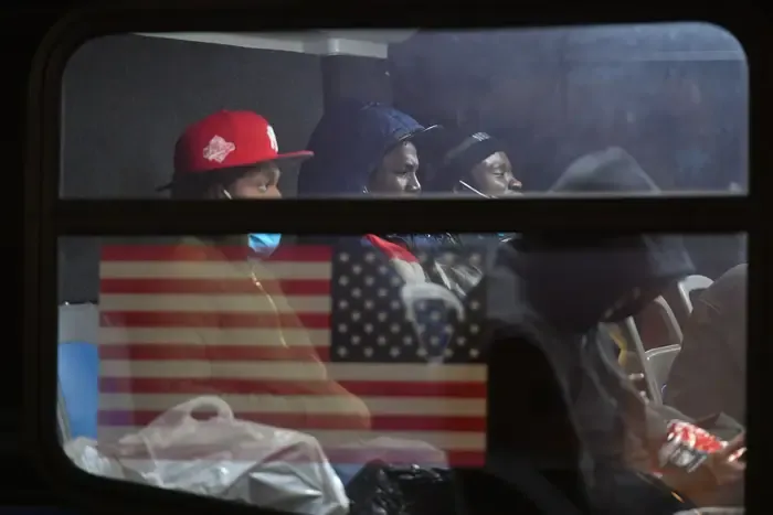 First migrants arrive at Floyd Bennett Field in NYC, but flee after one ...